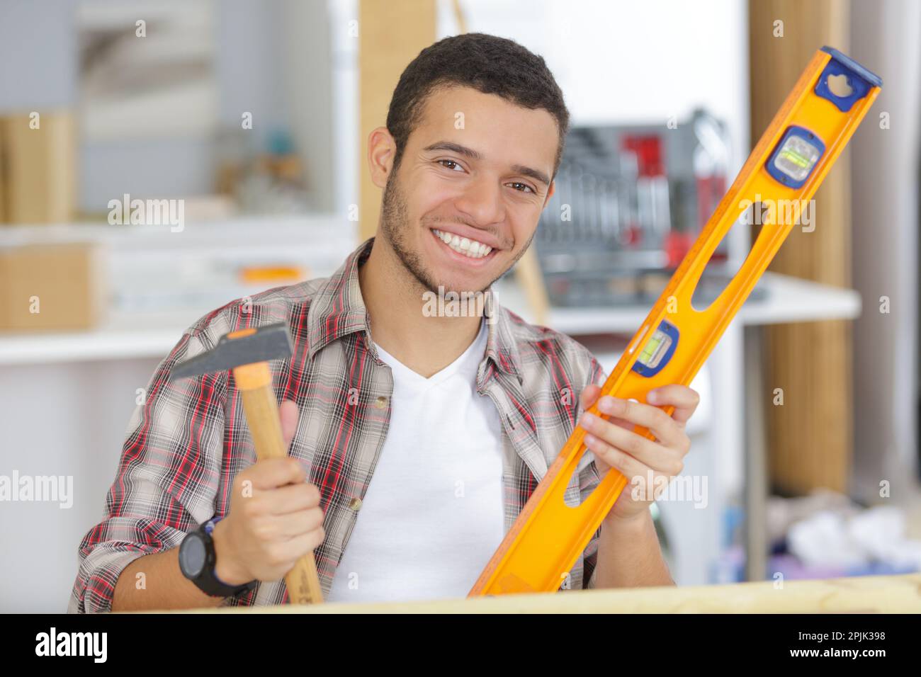 Portrait smiling carpenter screwdriver hi-res stock photography and ...