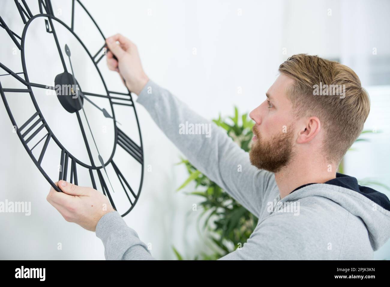 Man and clock and changing hi-res stock photography and images - Alamy