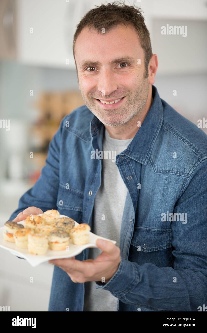 Man eating crackers not woman hi-res stock photography and images - Alamy