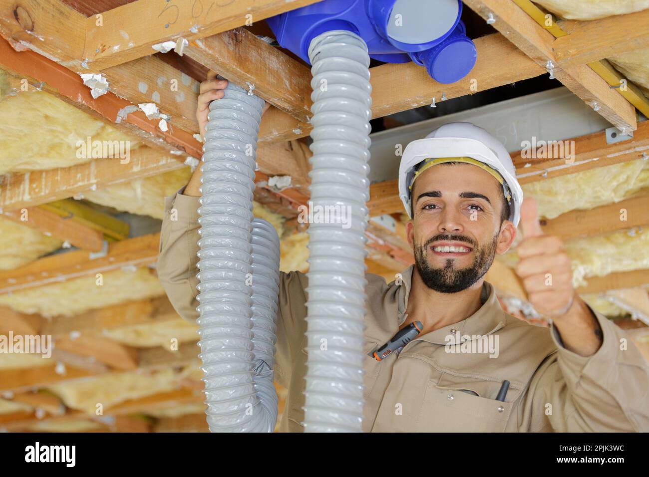 hvac technician ready to install ventilation system in house Stock ...