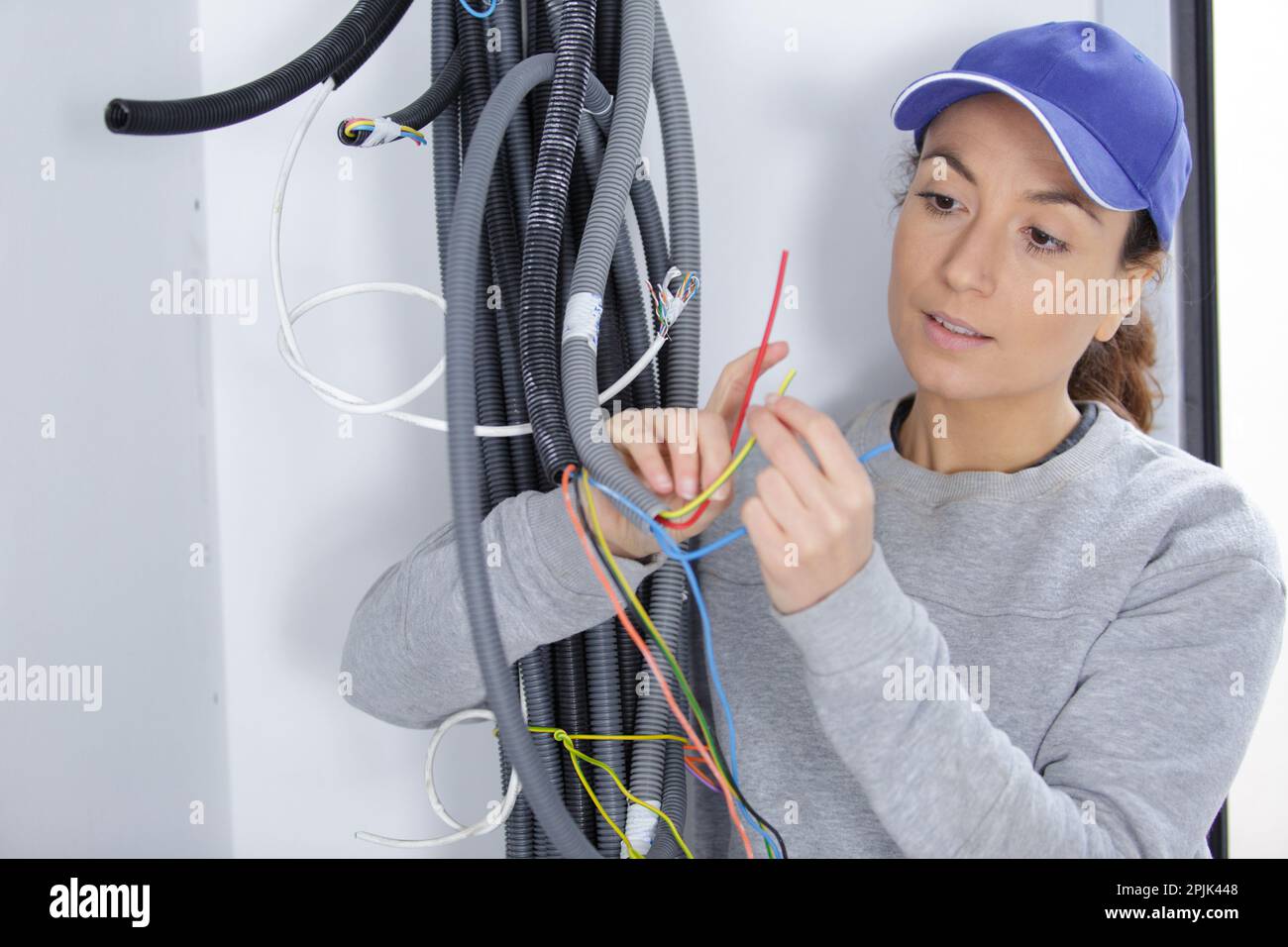 an electrician women at work Stock Photo - Alamy