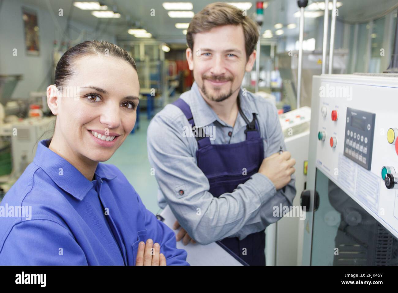 man and woman before using bench drill Stock Photo - Alamy