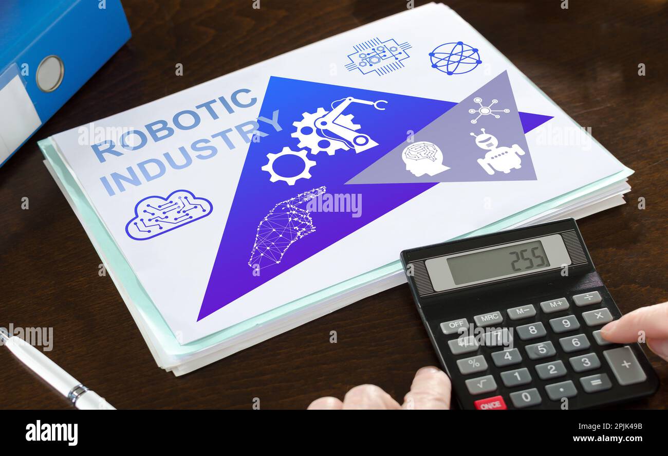 Robotic industry concept illustrated on a paper with a calculator Stock ...
