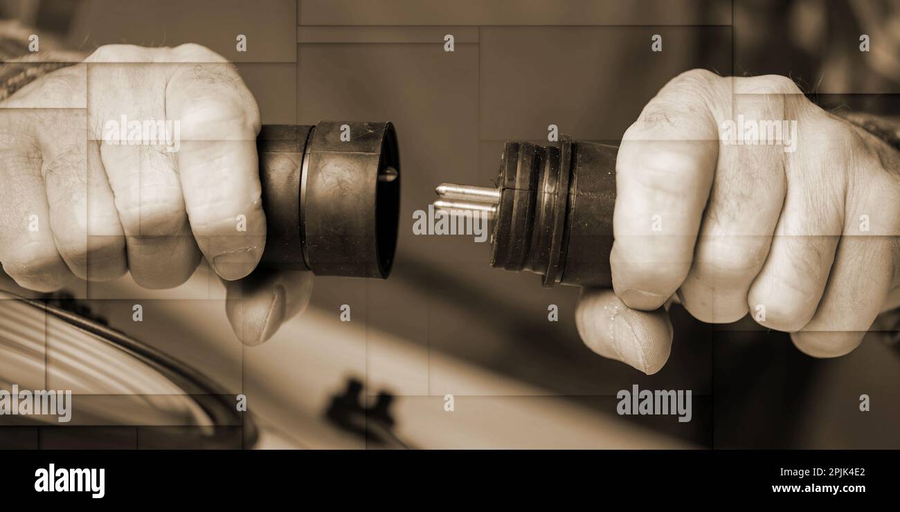 Electrician hands holding electrical plugs, geometric pattern Stock ...