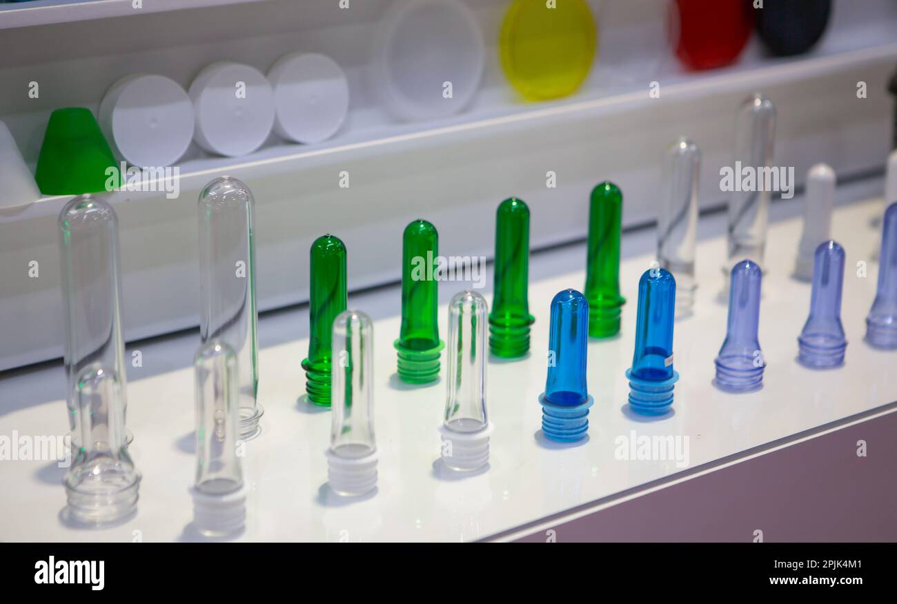 Raw material tubes for making plastic bottle. Industrial manufacturing ...