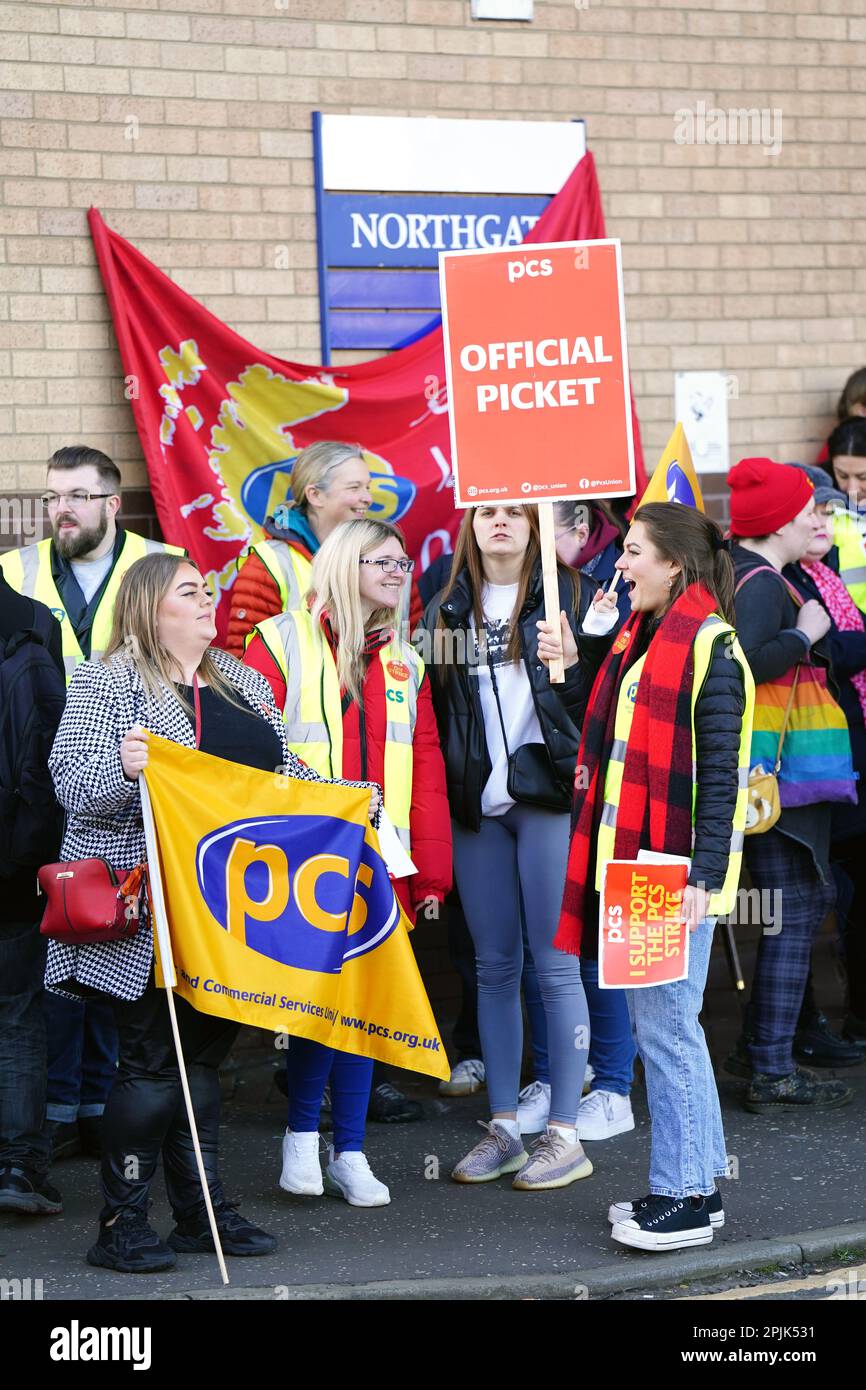 Members of the PCS union on the picket line outside the Passport Office ...