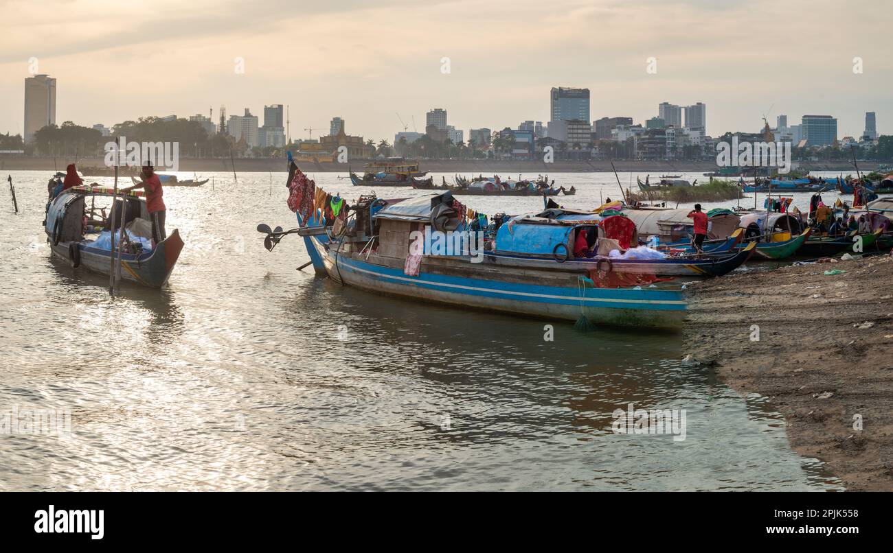 Phnom Penh,Cambodia-December 24th 2022:Small narrow boats,partially ...