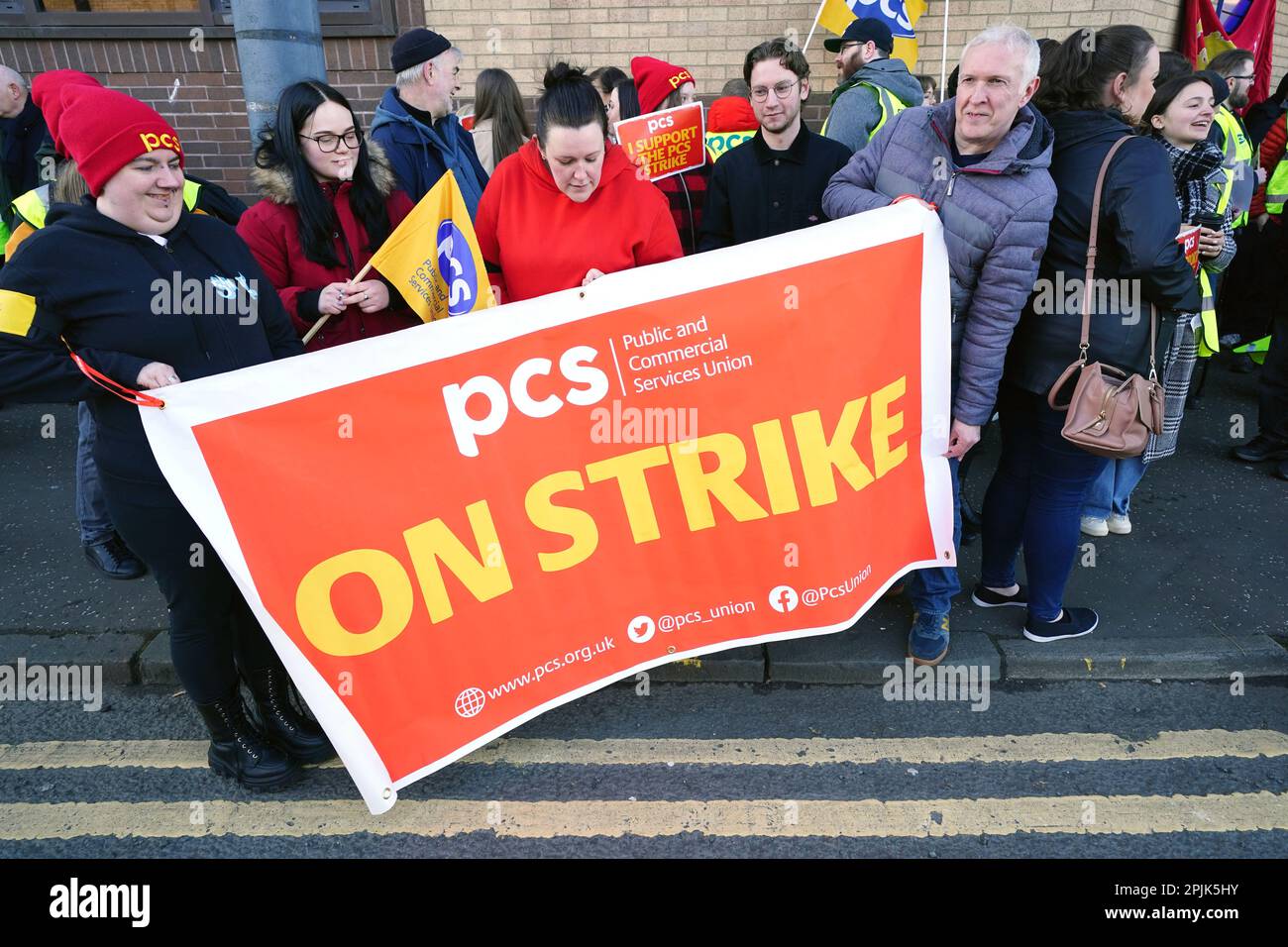Members of the PCS union on the picket line outside the Passport Office ...