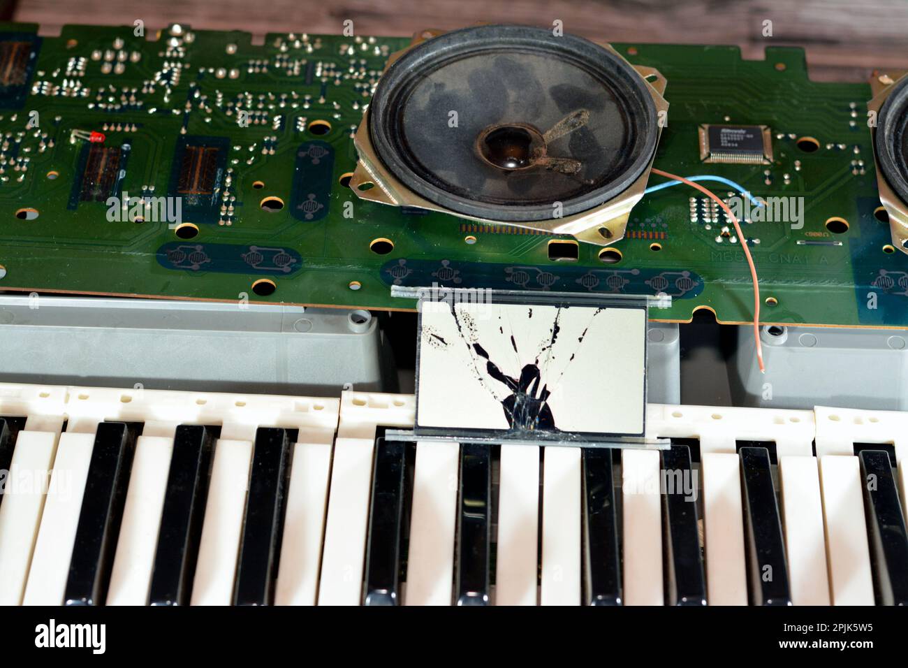 Cairo, Egypt, April 1 2023: Broken electronic musical keyboard, cracked ...