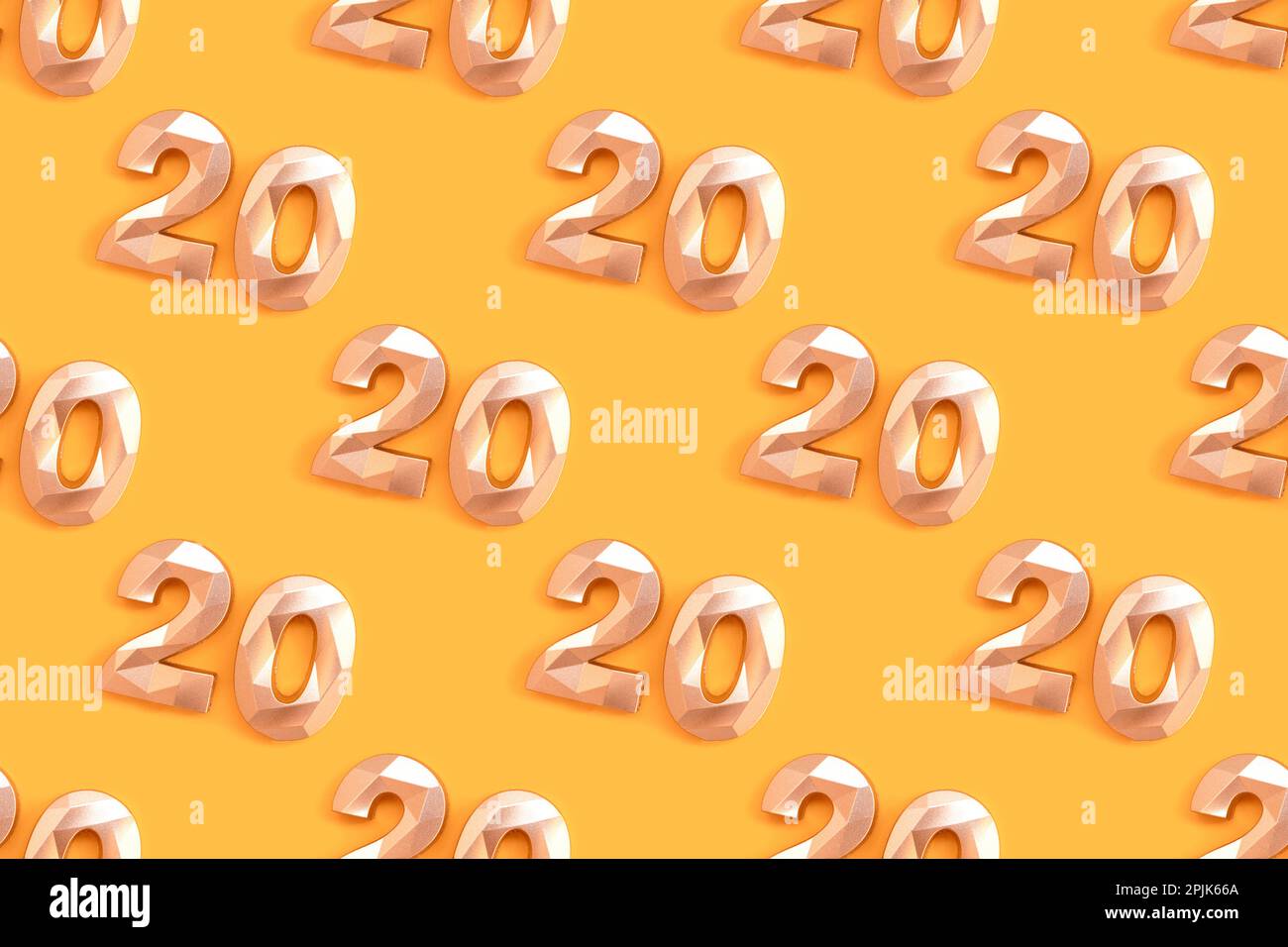 Pattern made of golden number twenty on a yellow background Stock Photo ...