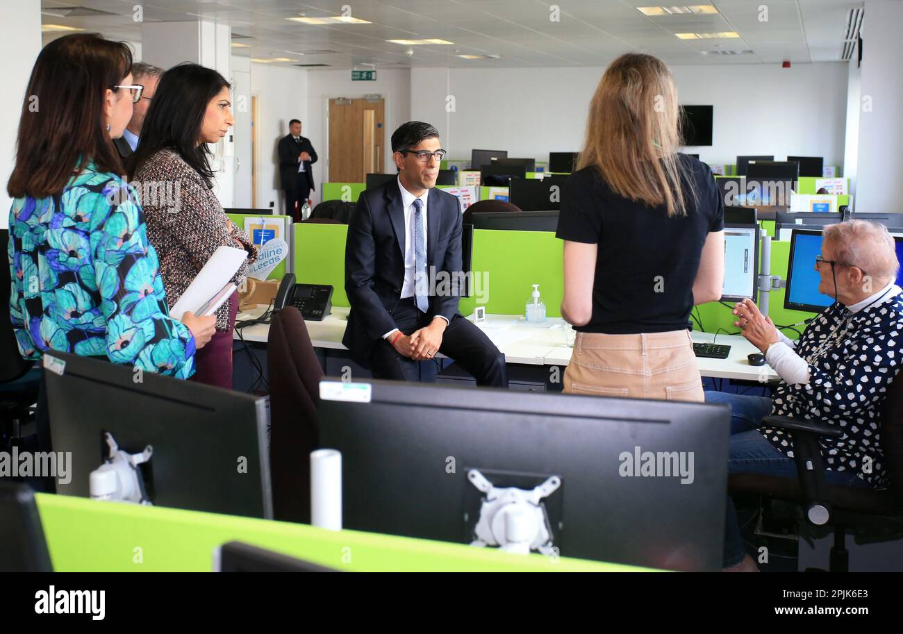 Prime Minister Rishi Sunak (centre), and Home Secretary Suella ...