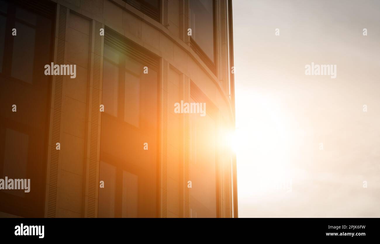 modern building with a beam of light. office architecture at sunset ...