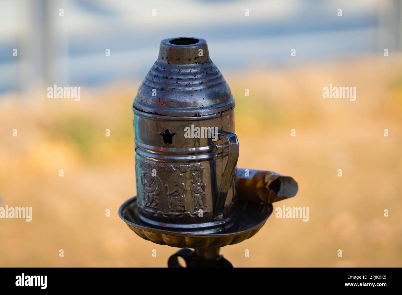 A real Syrian hookah on a beach in the Sea of Galilee - Israel. Blurred ...