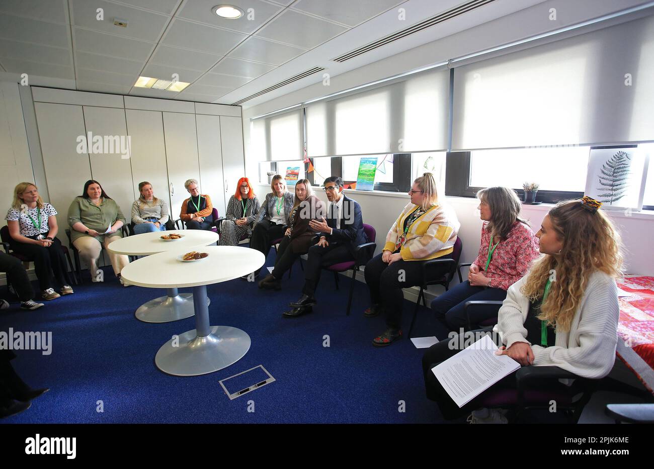 Prime Minister Rishi Sunak (fourth right) during a visit to the offices ...
