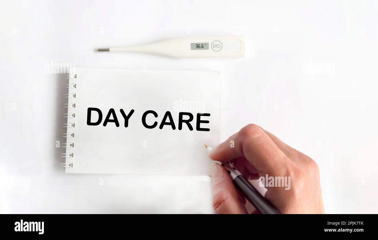 The text of the day of care, a woman's hand writes on a notebook, next ...