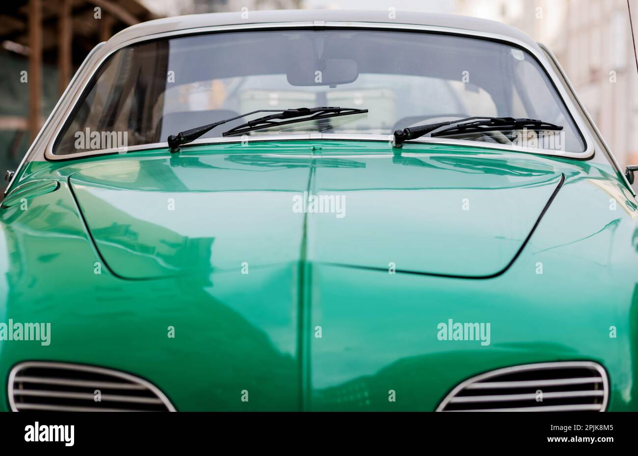 front view of a retro car. windshield and wipers of a vintage ...