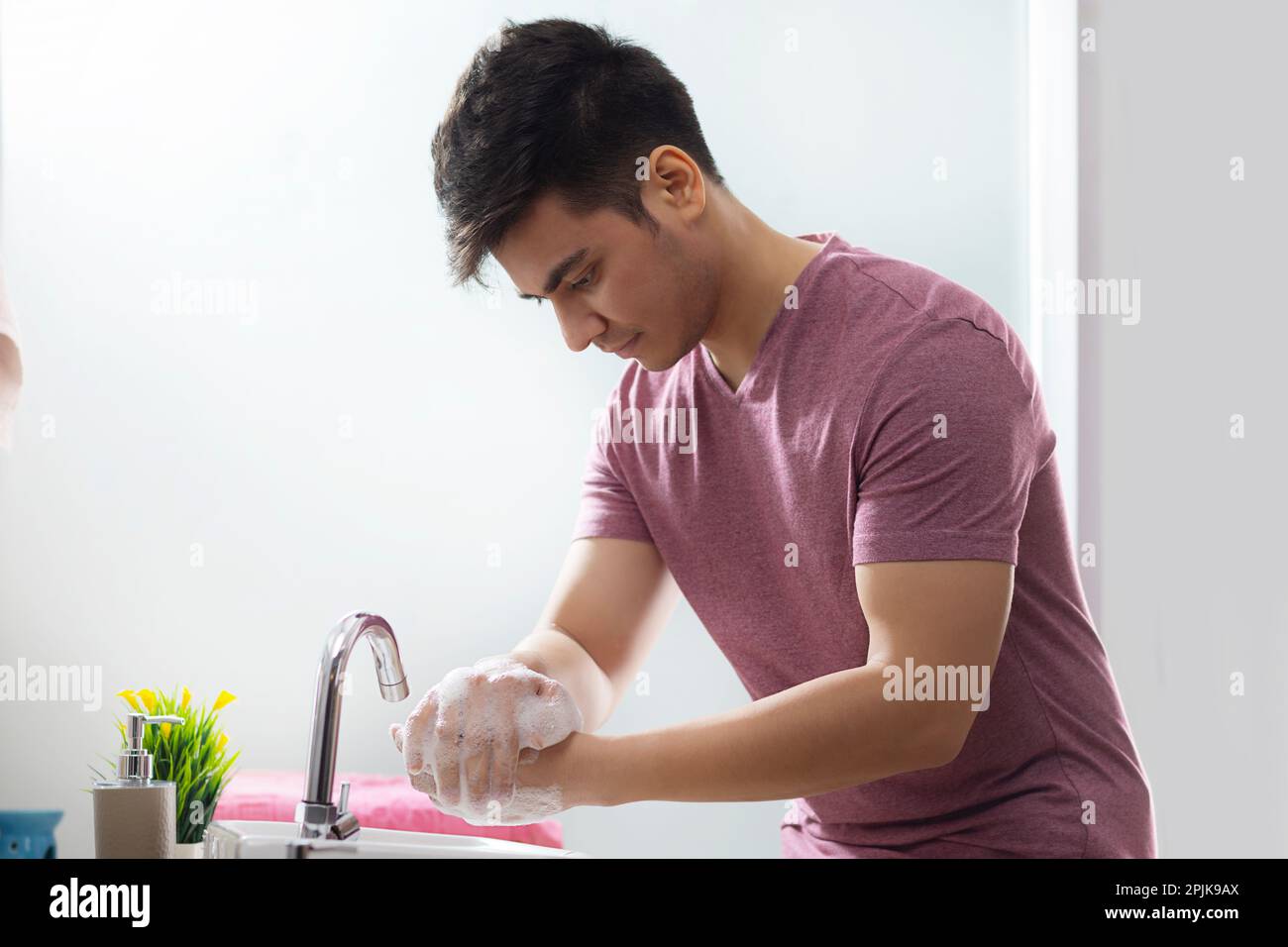 Asian man washing hands hi-res stock photography and images - Alamy