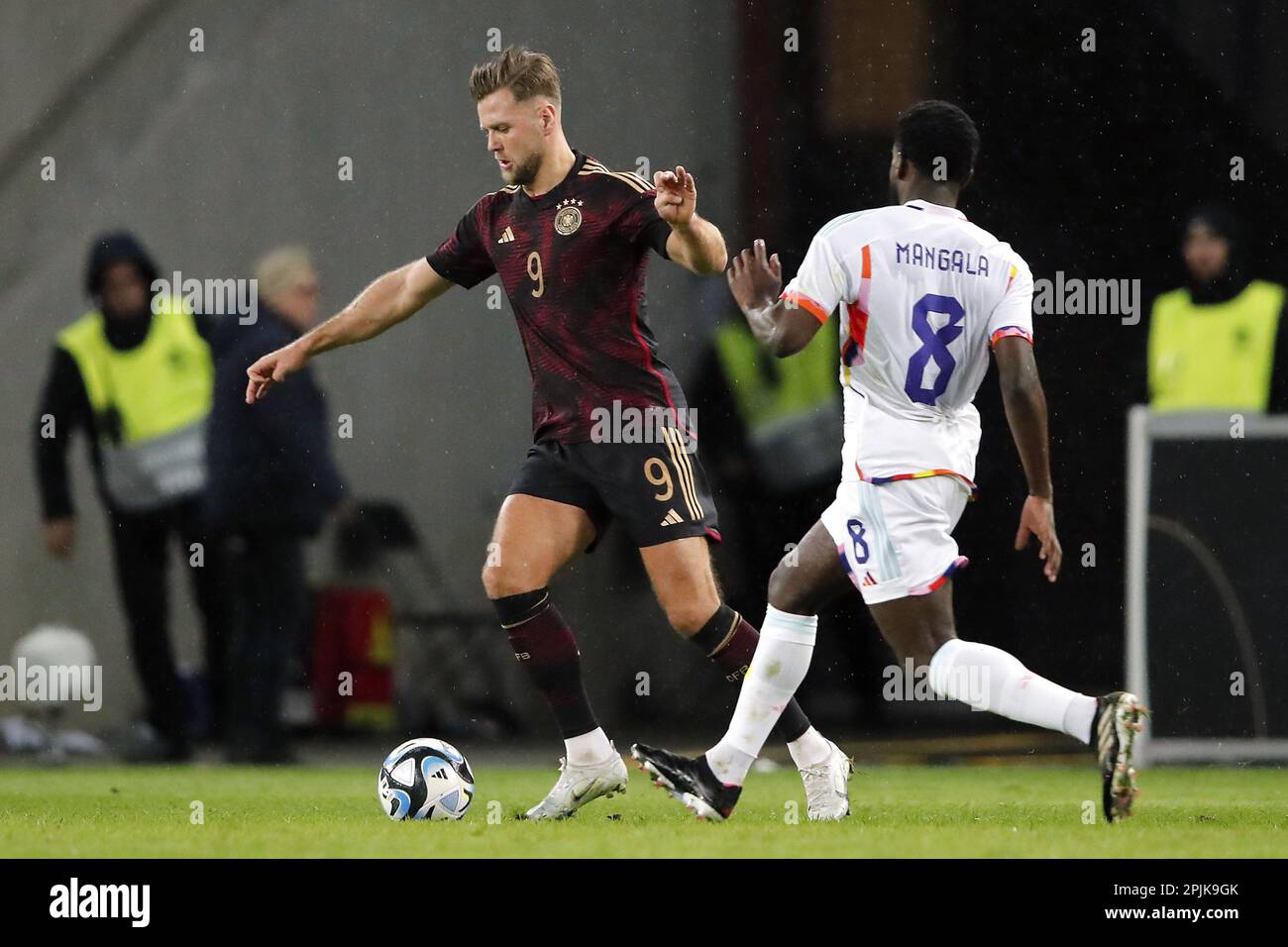 COLOGNE - (lr) Niclas Fullkrug of Germany, Orel Mangala of Belgium ...