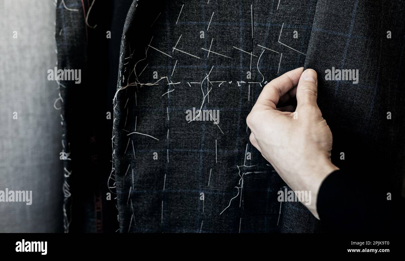 atelier for tailoring. professional tailor working Stock Photo - Alamy