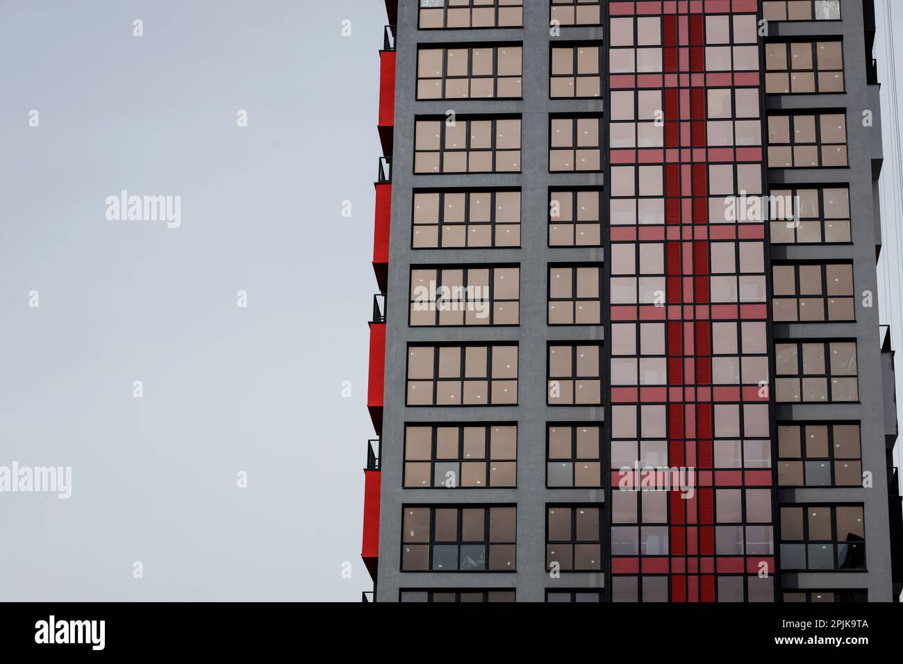 modern apartment complex with colored windows. new building exterior ...