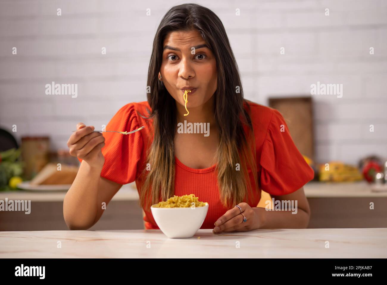 Woman noodles bowl hi-res stock photography and images - Alamy