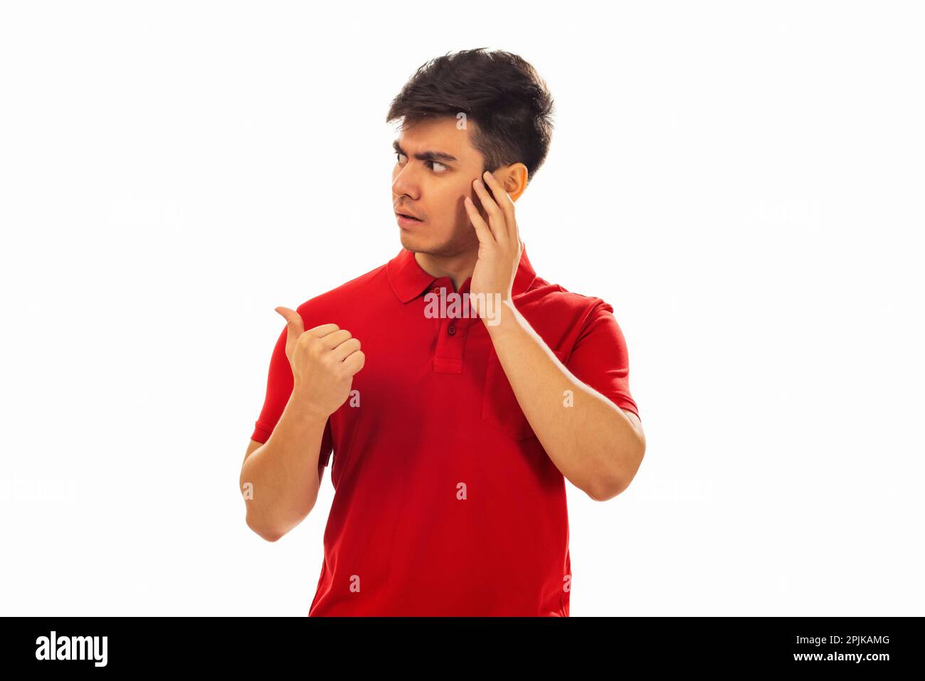 Pointing at cheek hi-res stock photography and images - Alamy