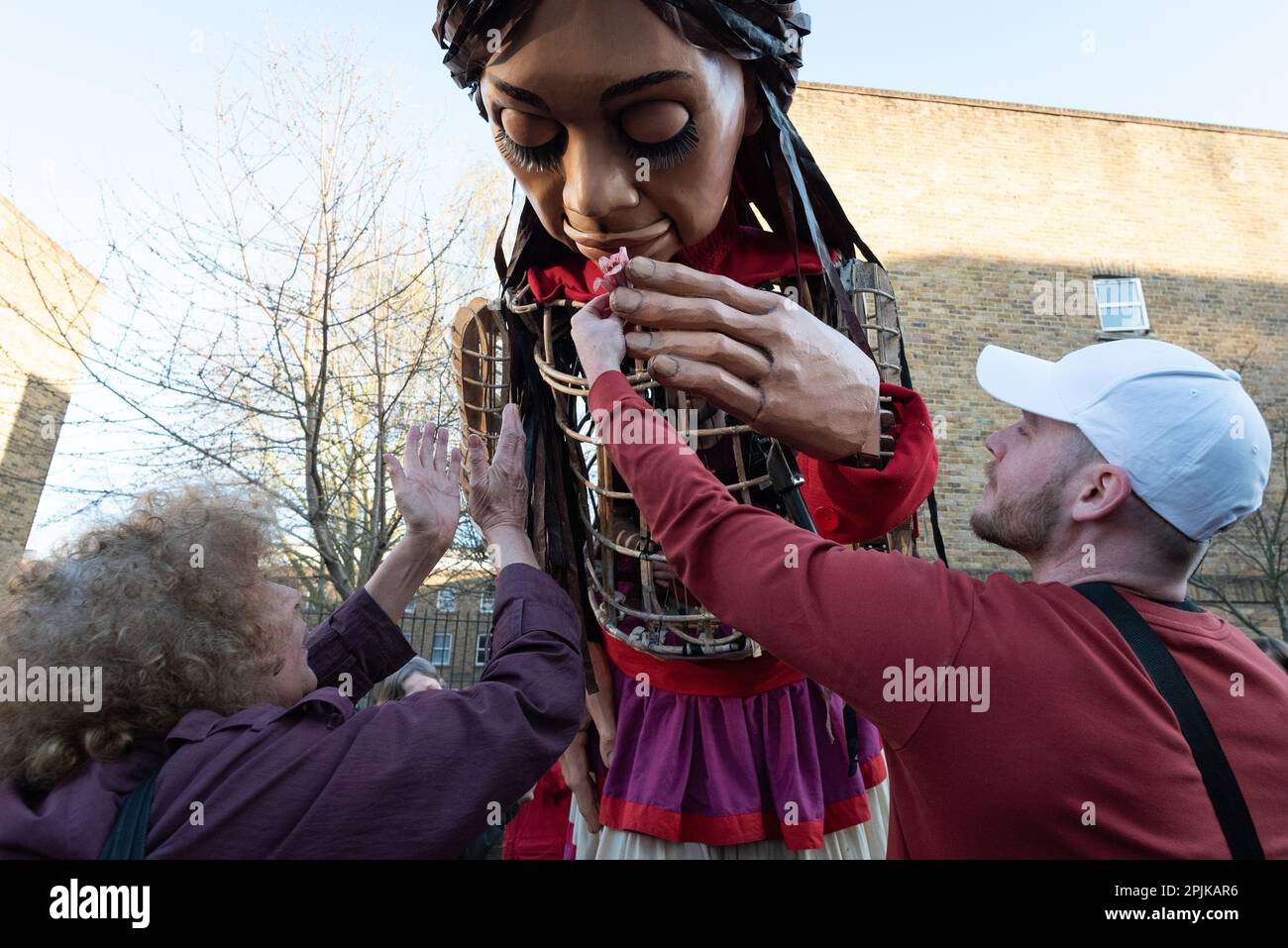 Little Amal - a 3.5m puppet of a Syrian child - leads a parade through ...