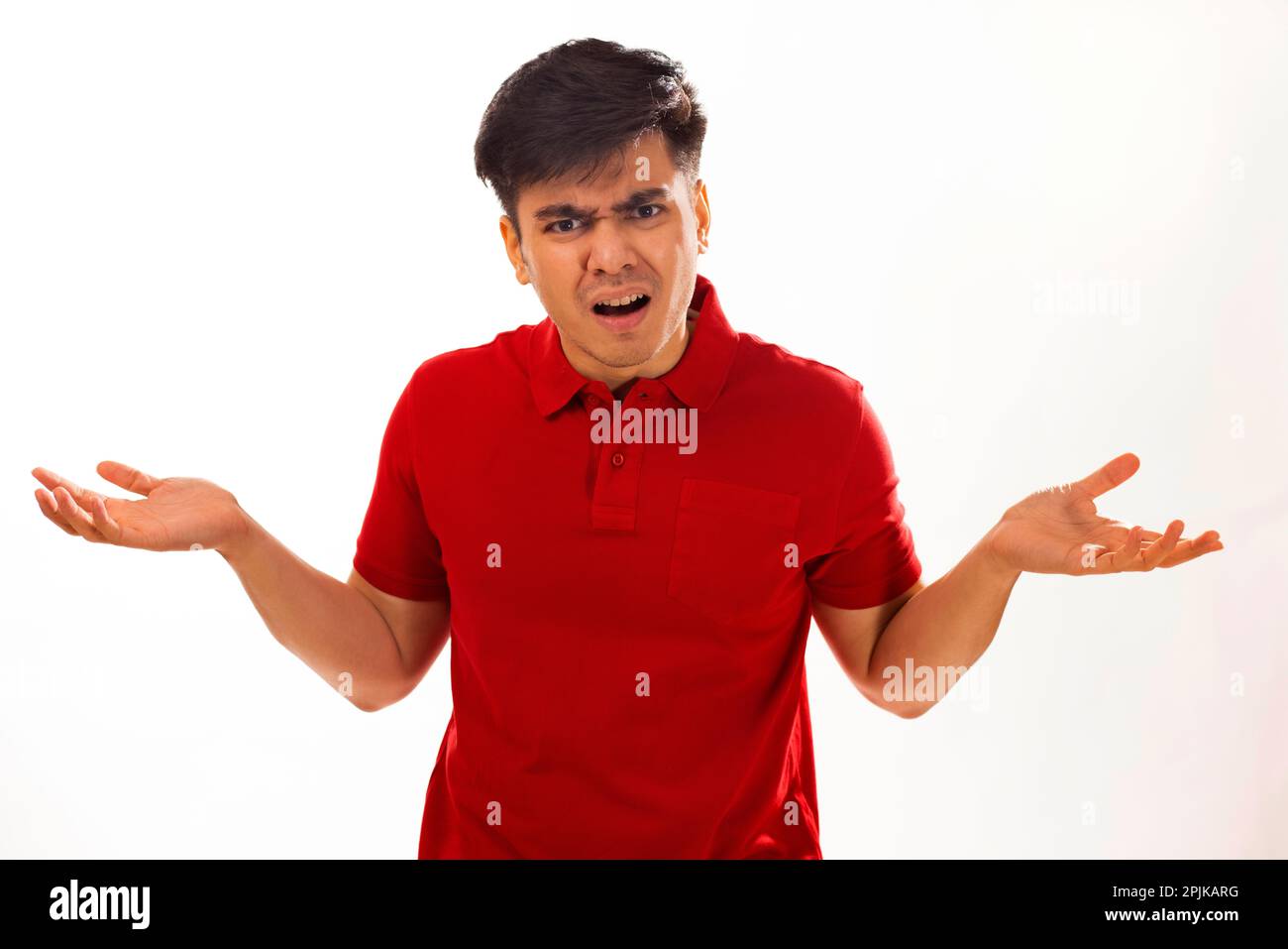 Man shrugging looking camera hi-res stock photography and images - Alamy