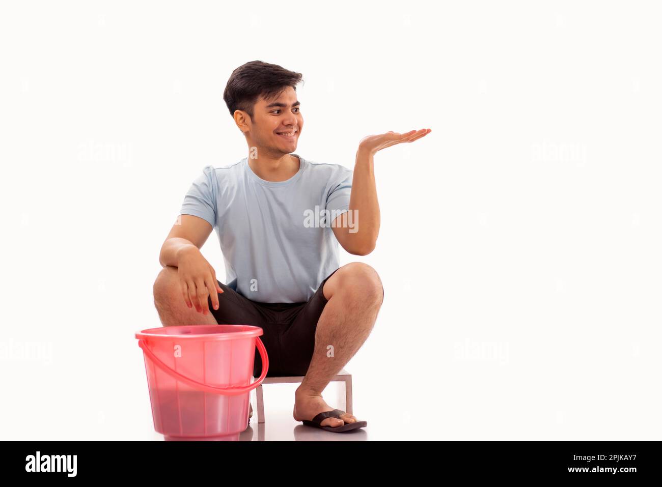 Man Washing Clothes By Hand