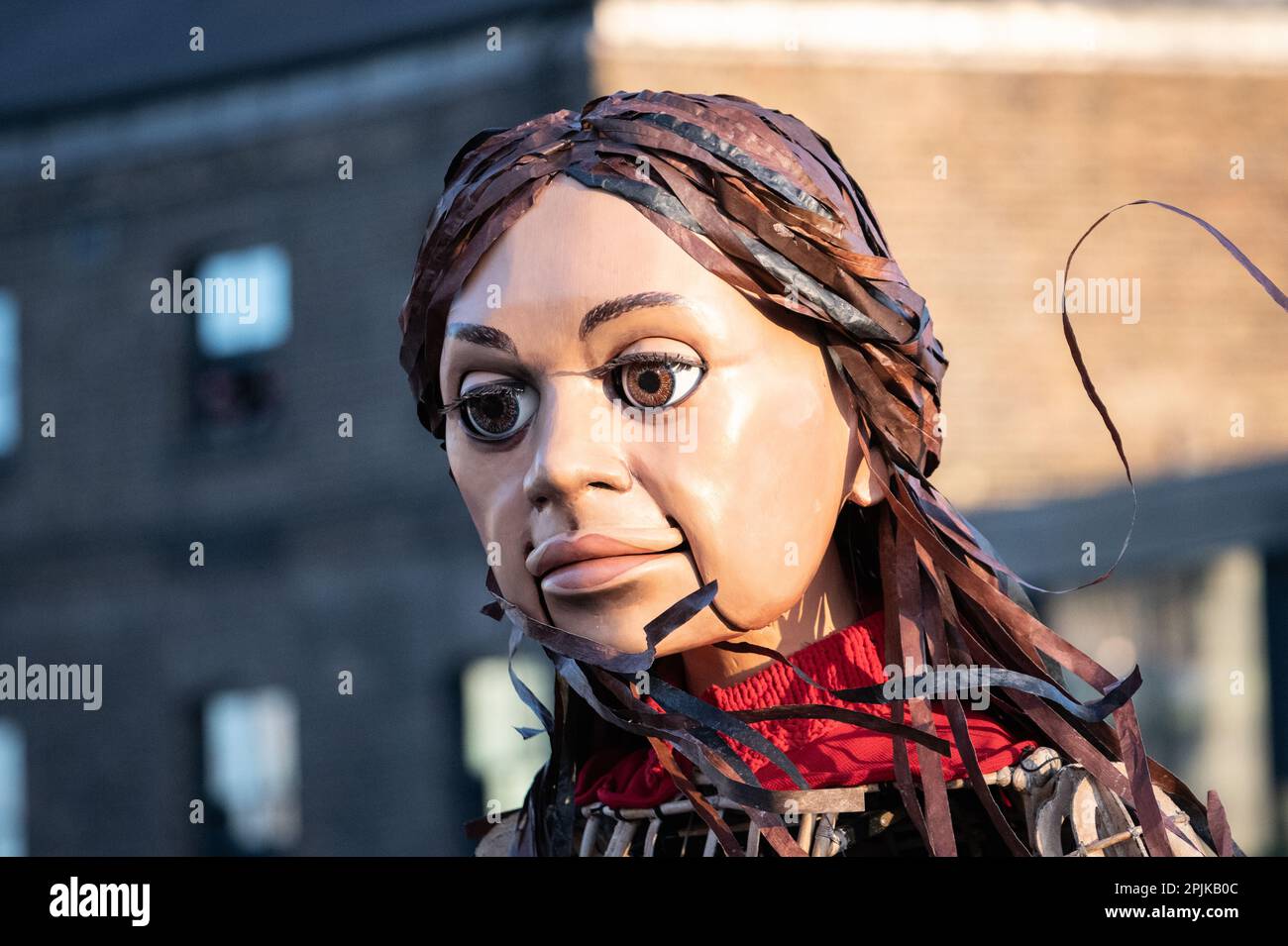 Little Amal - a 3.5m puppet of a Syrian child - leads a parade through ...