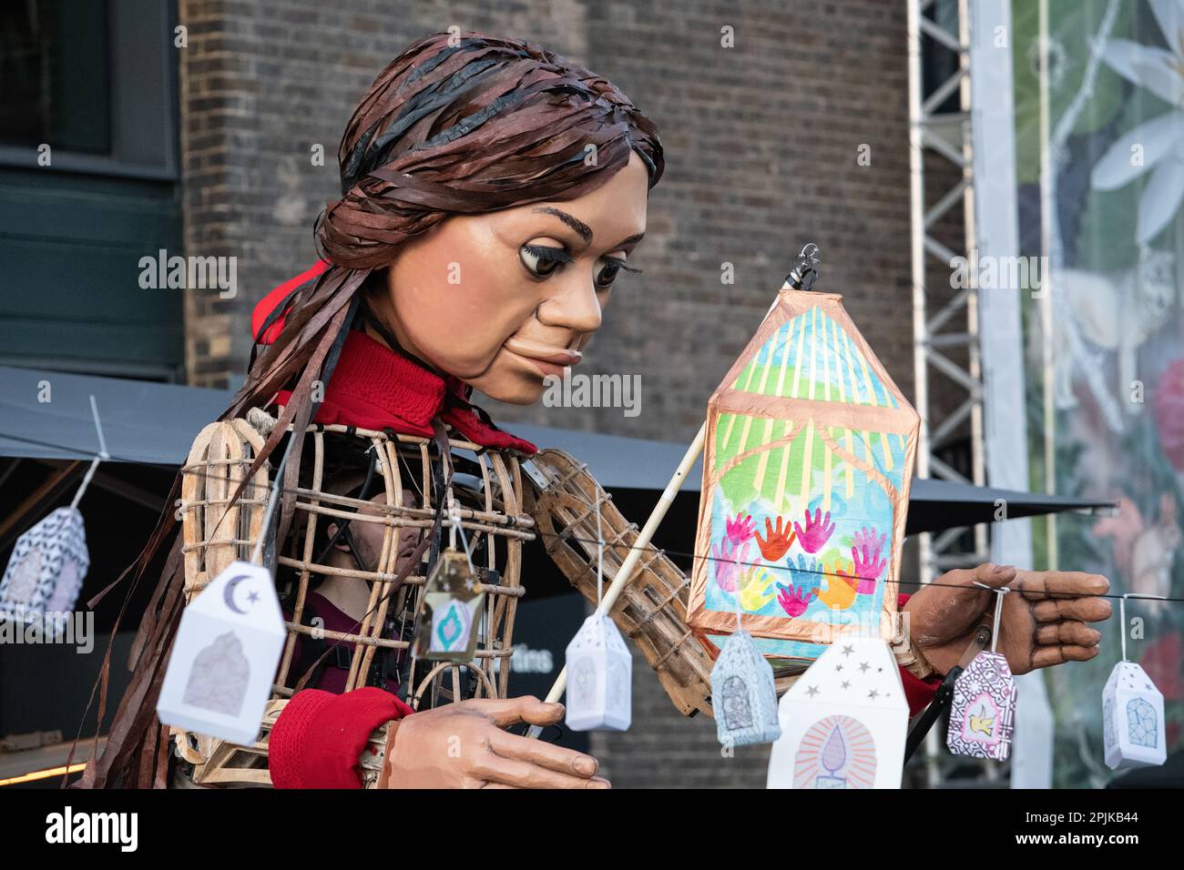 Little Amal - a 3.5m puppet of a Syrian child - leads a parade through ...
