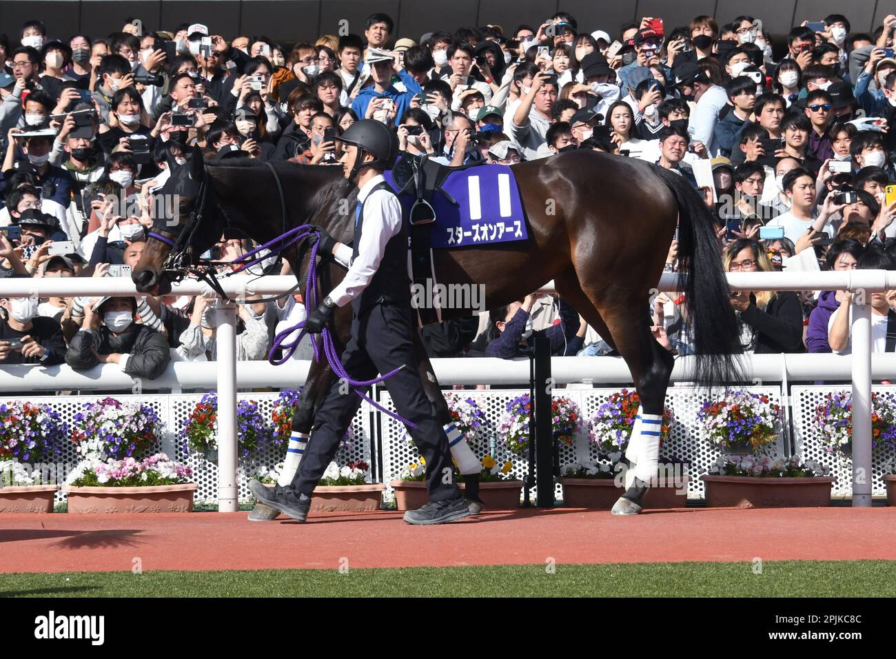 Hyogo, Japan. 2nd Apr, 2023. Stars on Earth is led through the paddock ...