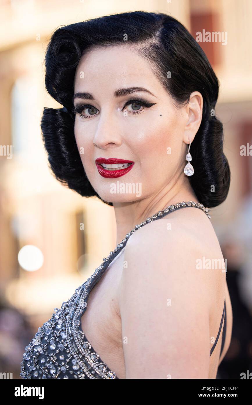 Dita Von Teese poses for photographers upon arrival at the Olivier ...