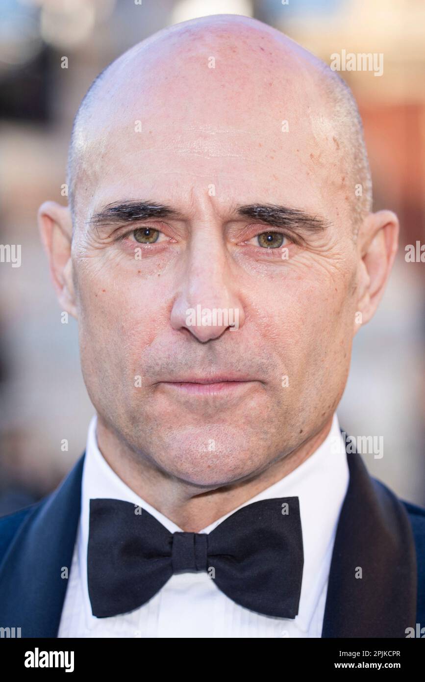 Mark Strong poses for photographers upon arrival at the Olivier Awards ...