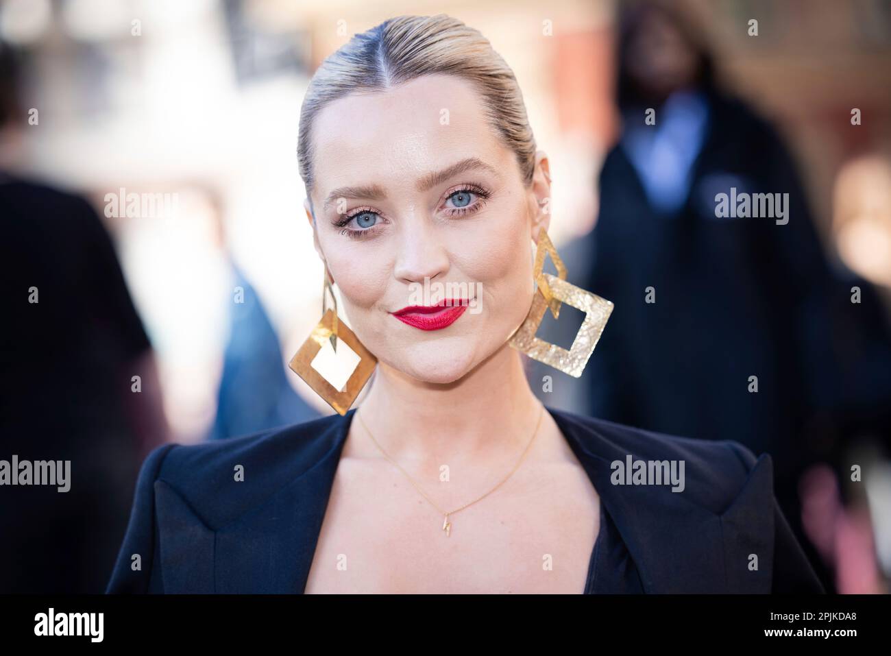 Laura Whitmore poses for photographers upon arrival at the Olivier ...