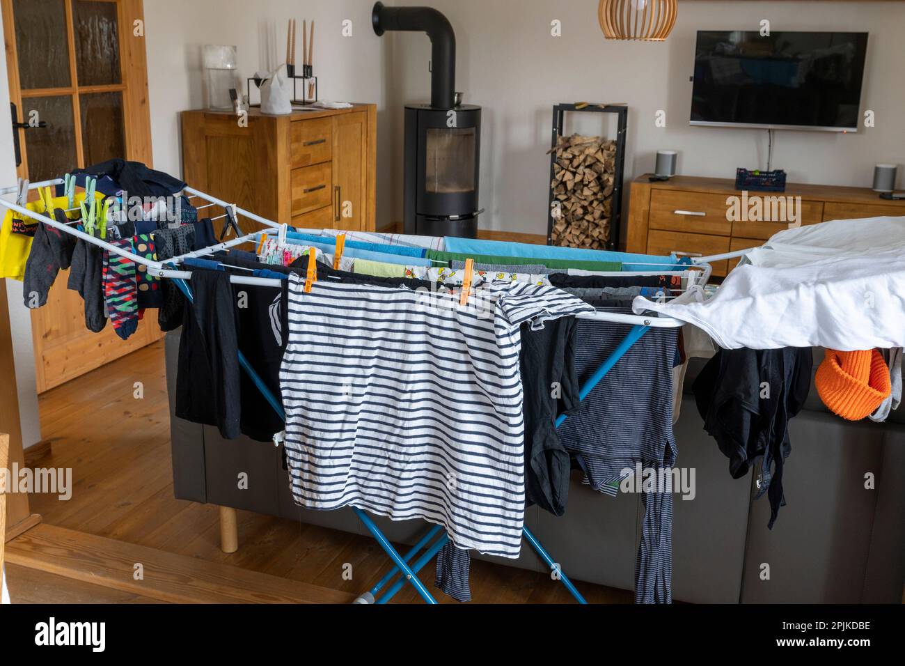 White clothes drying rack hi-res stock photography and images - Alamy