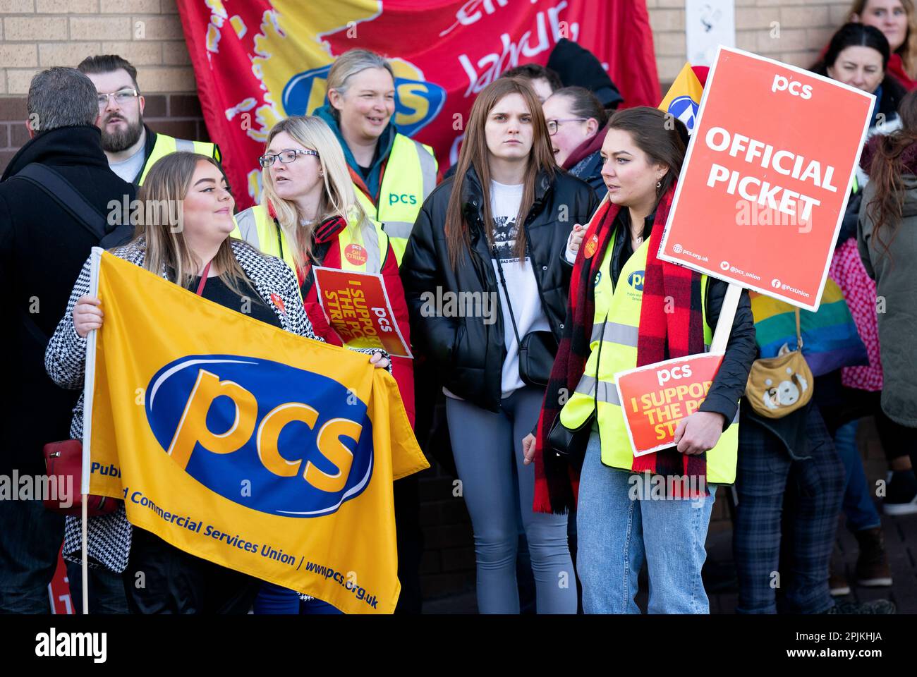 Members of the PCS union on the picket line outside the Passport Office ...