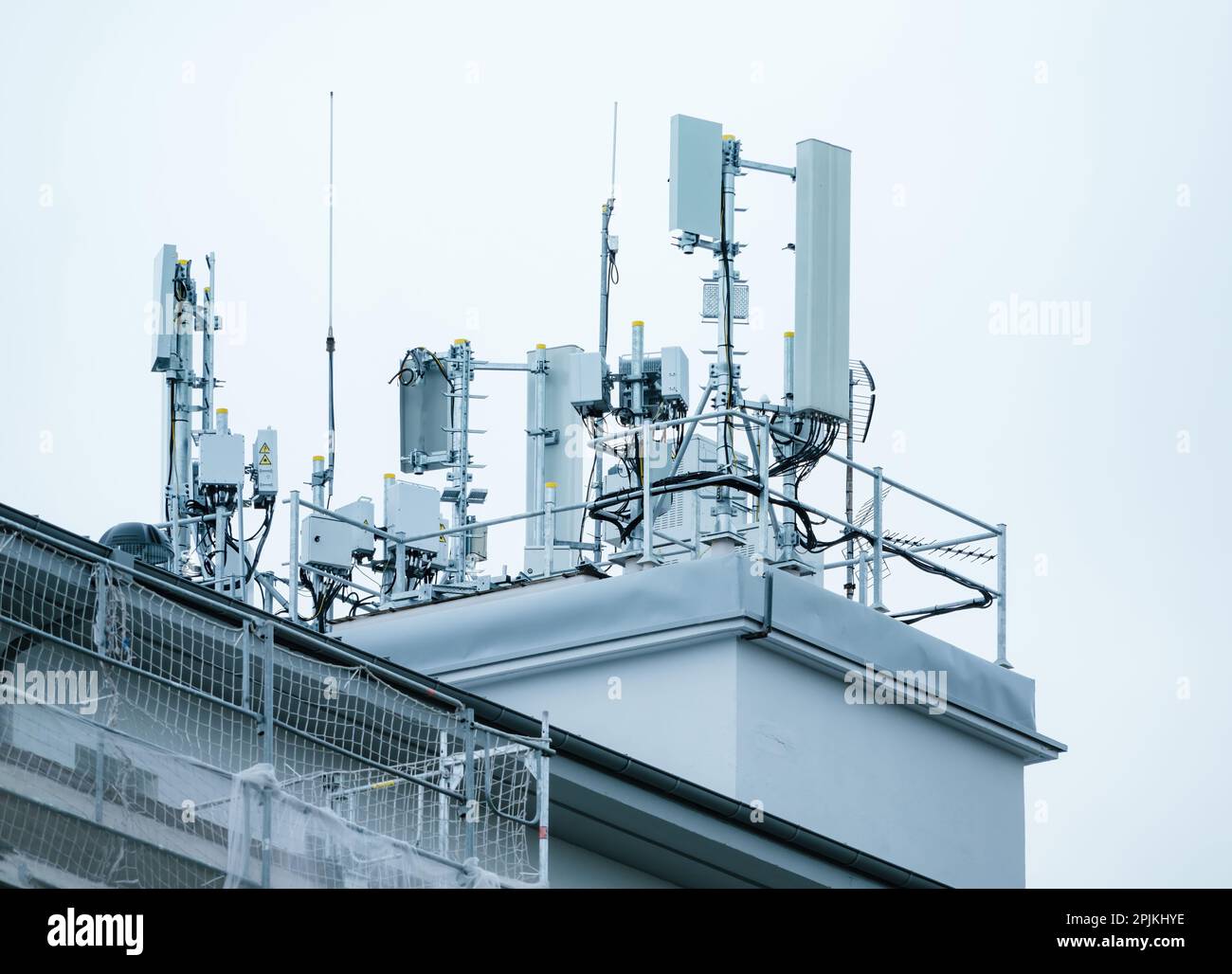 A 4G LTE antenna atop a built structure, connecting people and industry ...