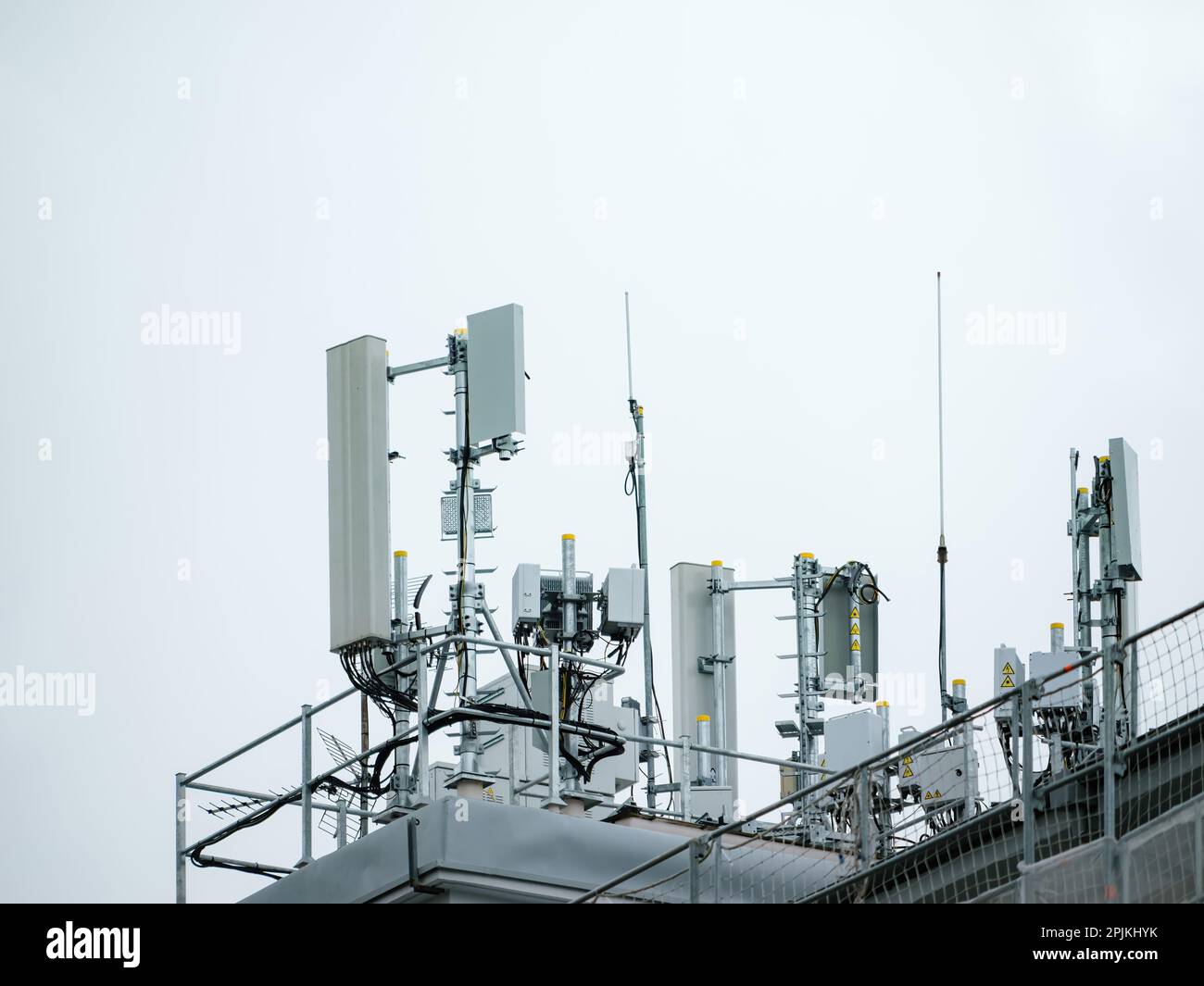 unique industrial structure stands tall, its blue color cast connecting ...