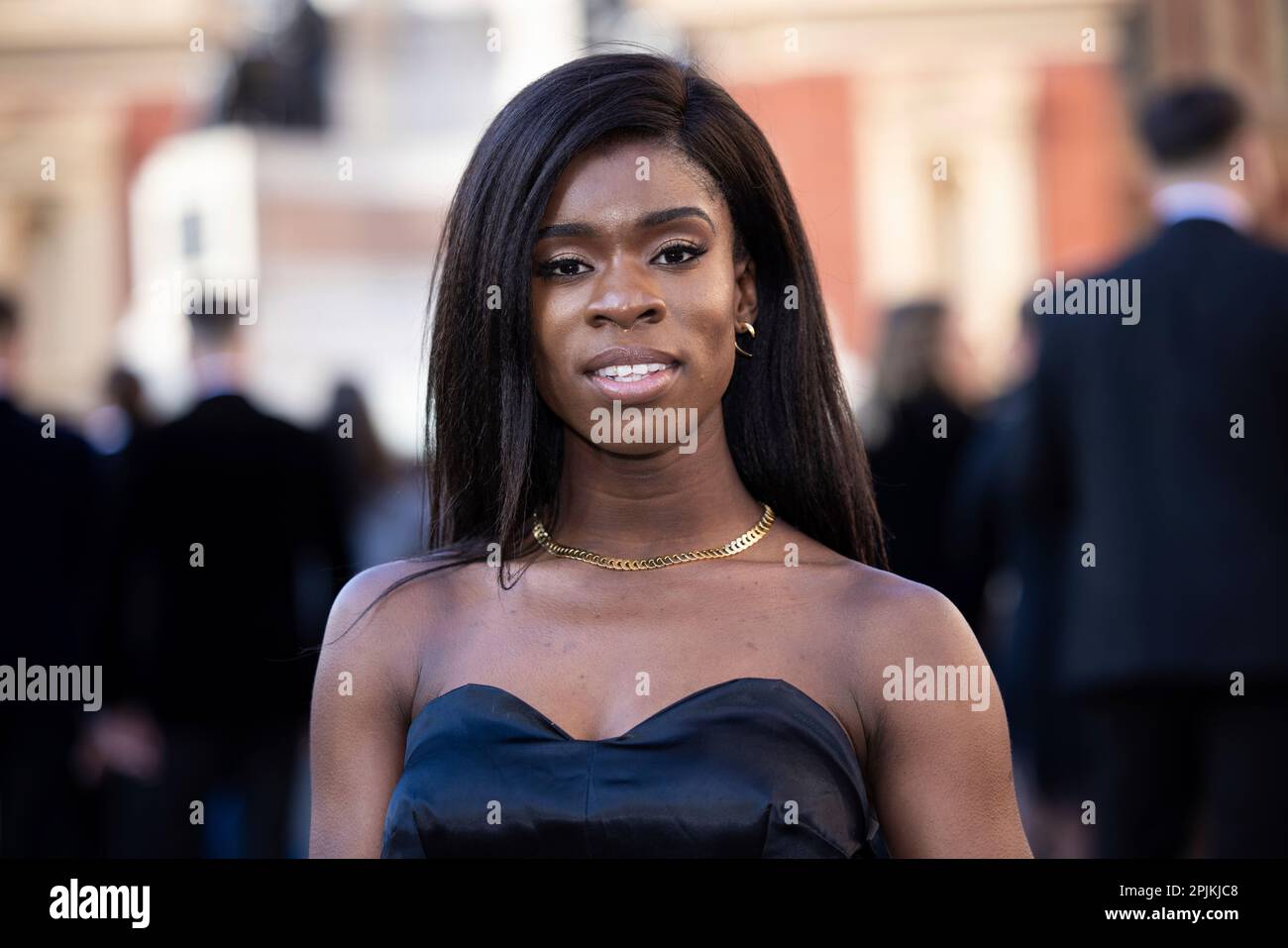 Faith Omole poses for photographers upon arrival at the Olivier Awards ...