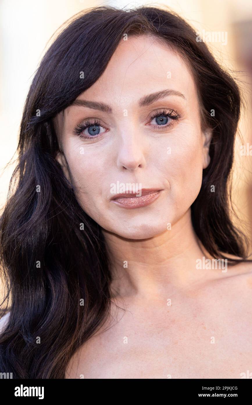Helen George poses for photographers upon arrival at the Olivier Awards ...