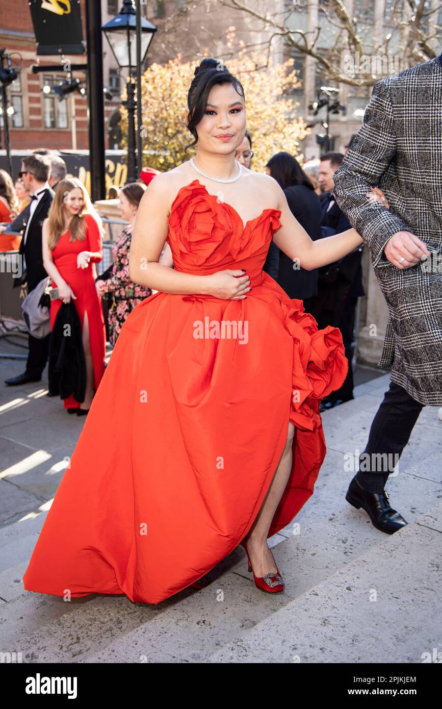 Mei Mac poses for photographers upon arrival at the Olivier Awards in ...