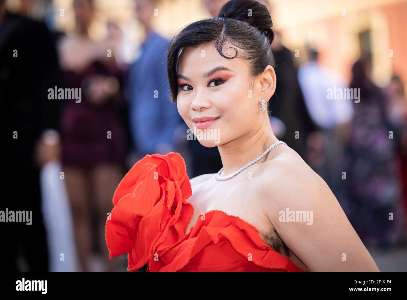 Mei Mac poses for photographers upon arrival at the Olivier Awards in London, Sunday, April 2 ...