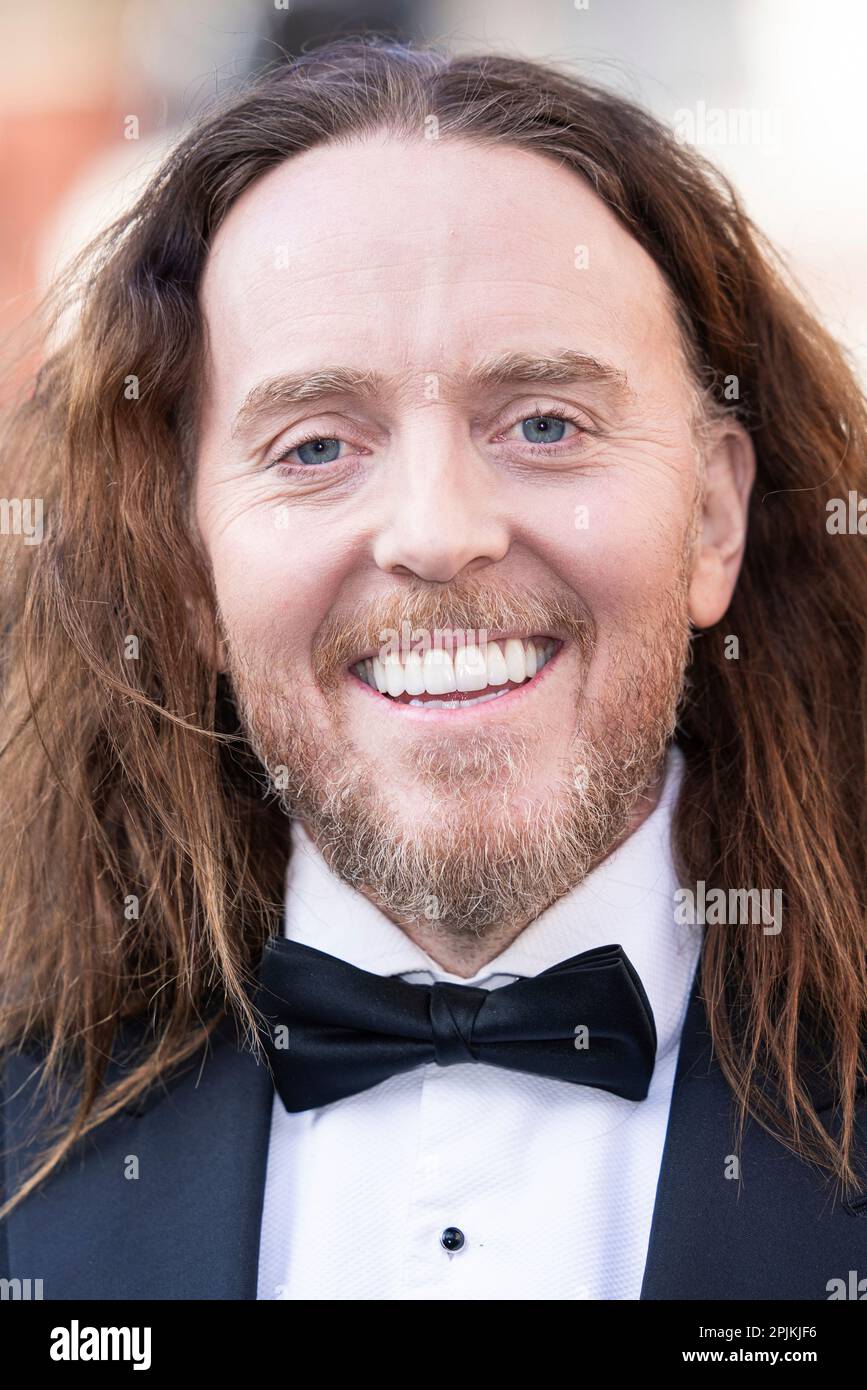 Tim Minchin poses for photographers upon arrival at the Olivier Awards ...