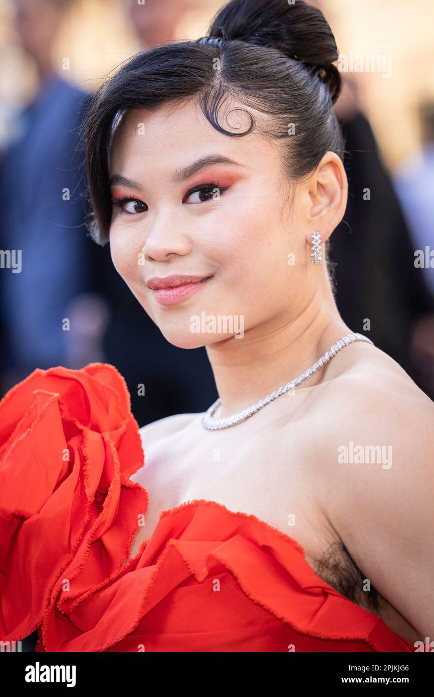Mei Mac poses for photographers upon arrival at the Olivier Awards in London, Sunday, April 2 ...