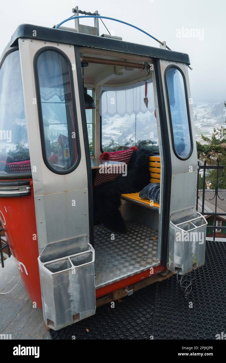Overhead cable car in front of sky at luxury hotel Stock Photo - Alamy