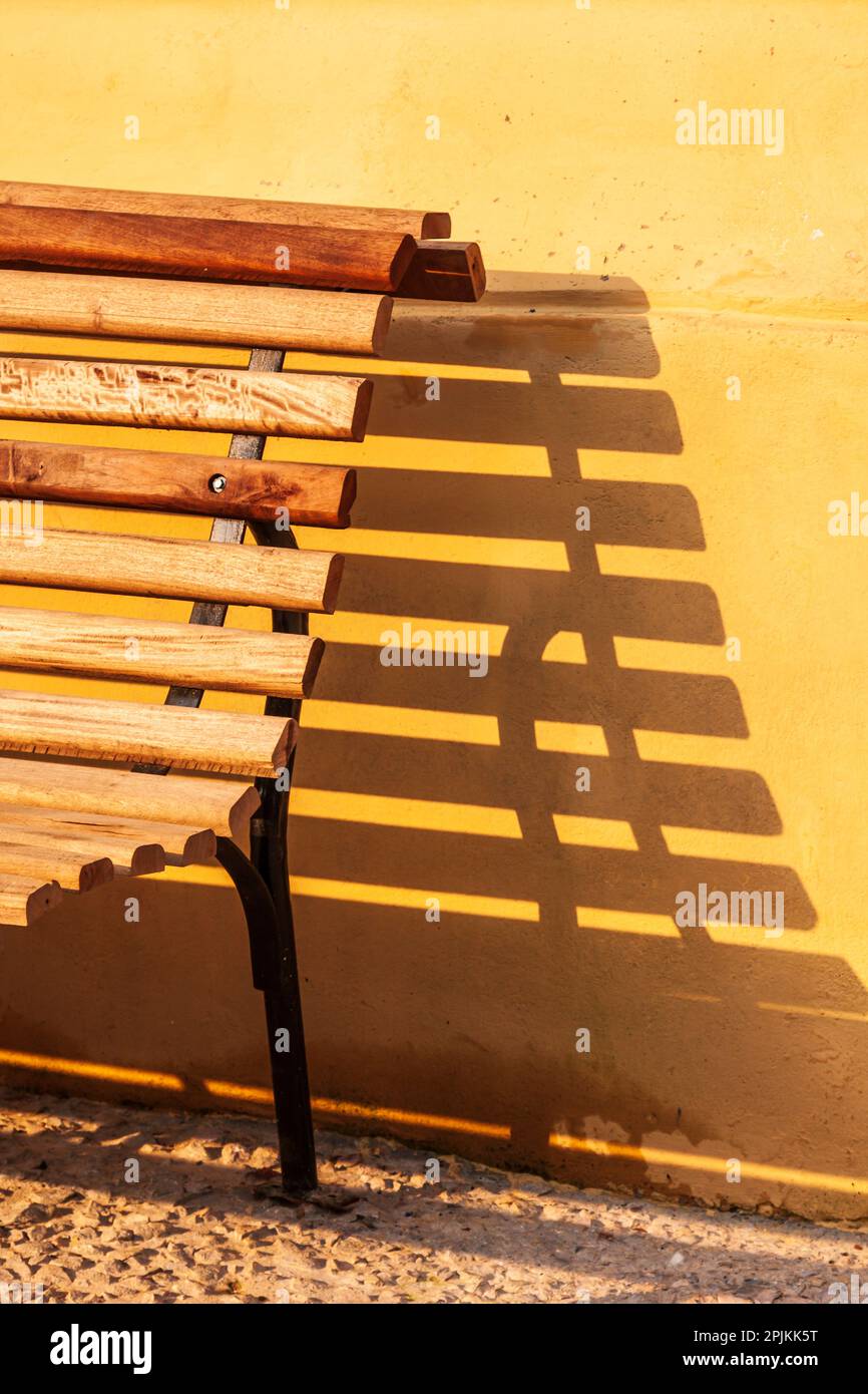 Bench and shadow Stock Photo - Alamy