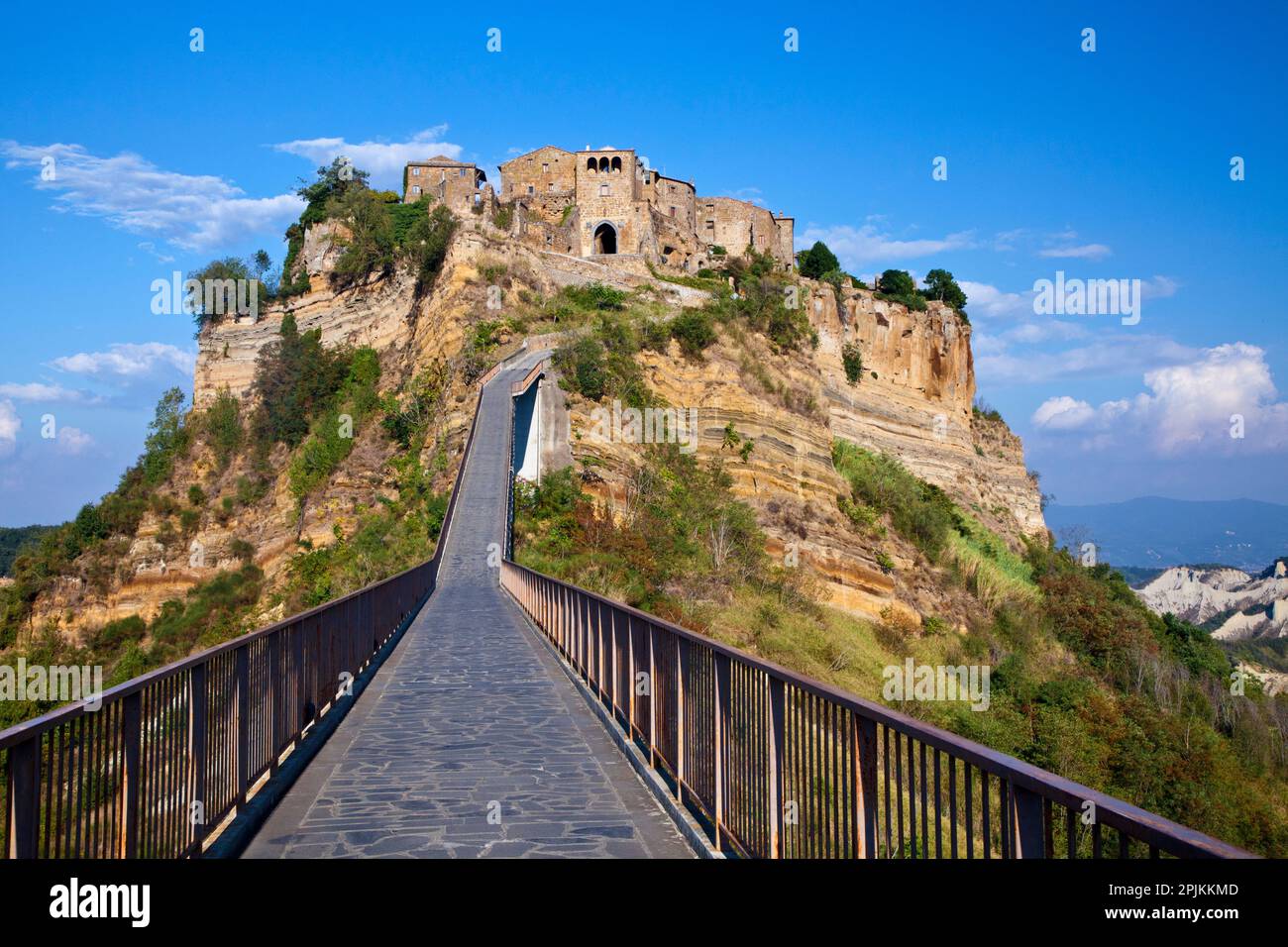 Italy, Tuscany. Evening view of Civita di Bagnoregio and the long ...