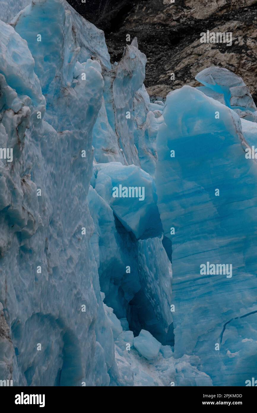 Ice glows brilliant blue at the terminus of Margerie Glacier Stock ...