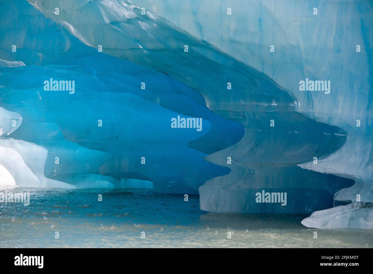 Melting patterns are amazing on this iceberg in Shakes Lake Stock Photo ...